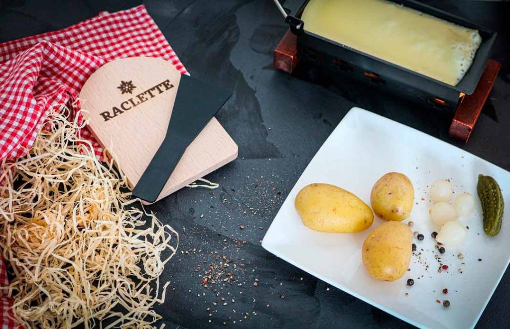 Raclette, un plato de queso suizo para disfrutar en compañía